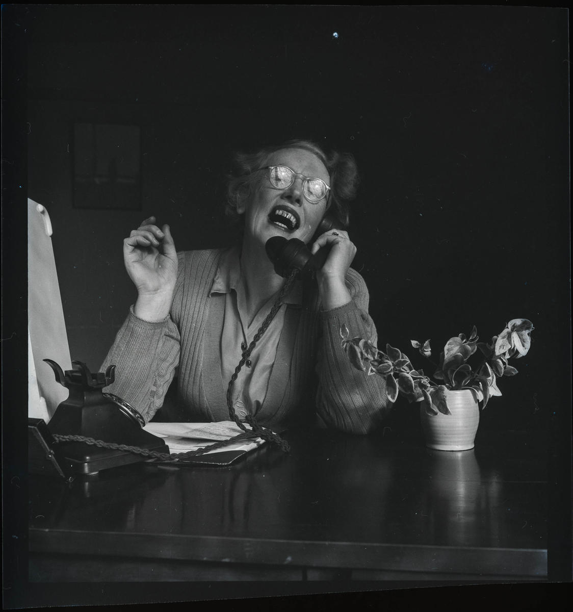 Negative: Woman on telephone - Canterbury Museum