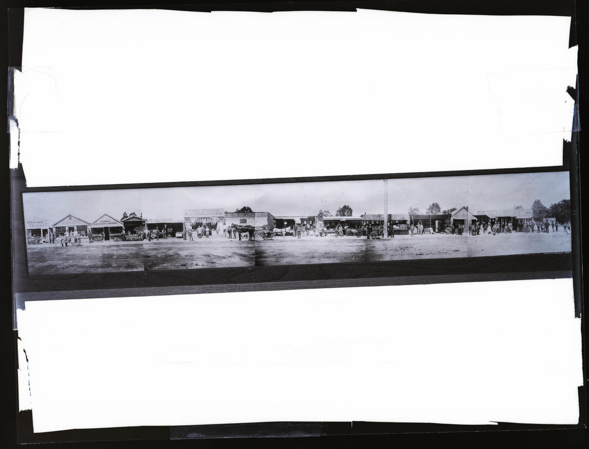 Glass Plate Negative: Shops at Market Square - Canterbury Museum